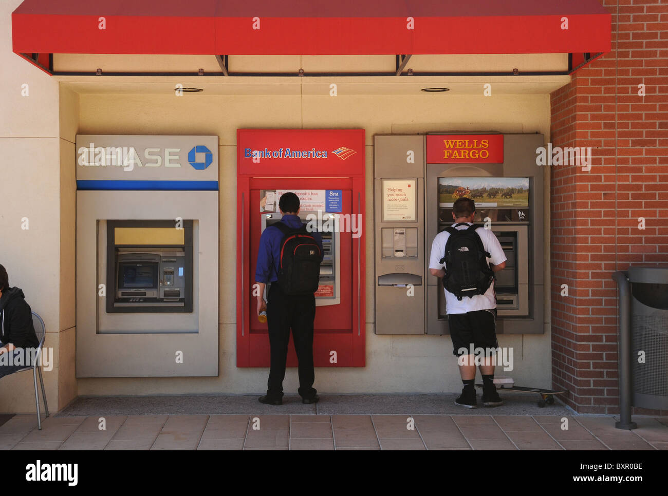 College students use an ATM Stock Photo - Alamy