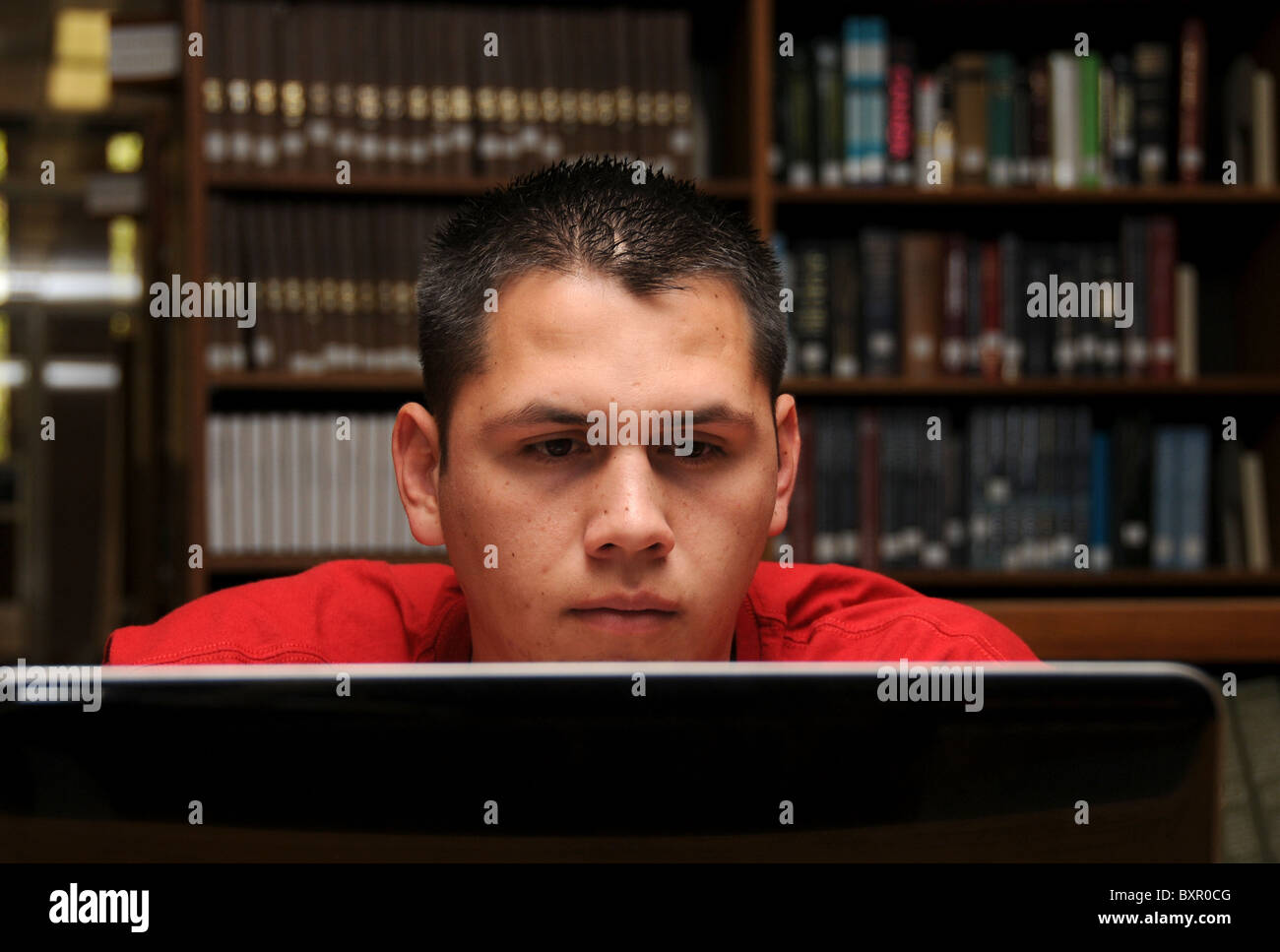 A college student works in the campus library Stock Photo - Alamy