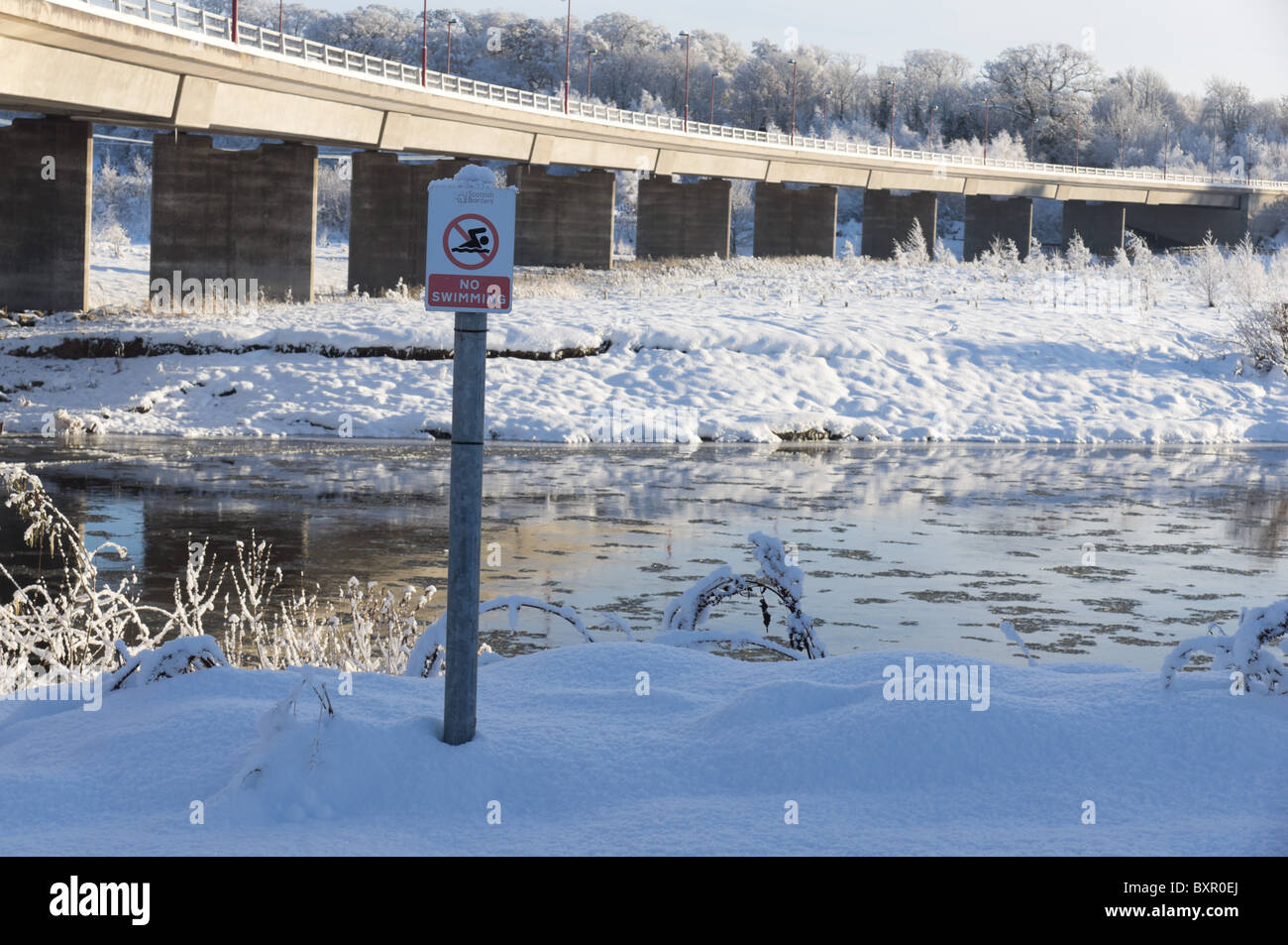 The River Tweed with ice and snow, Kelso, Scotland, midwinter - no ...