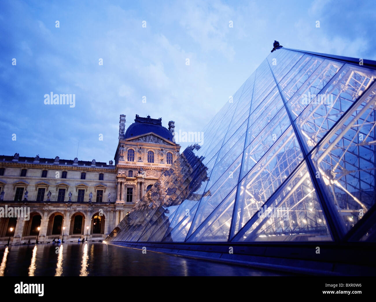The Pyramid Of The Louvre At Dusk Stock Photo - Alamy