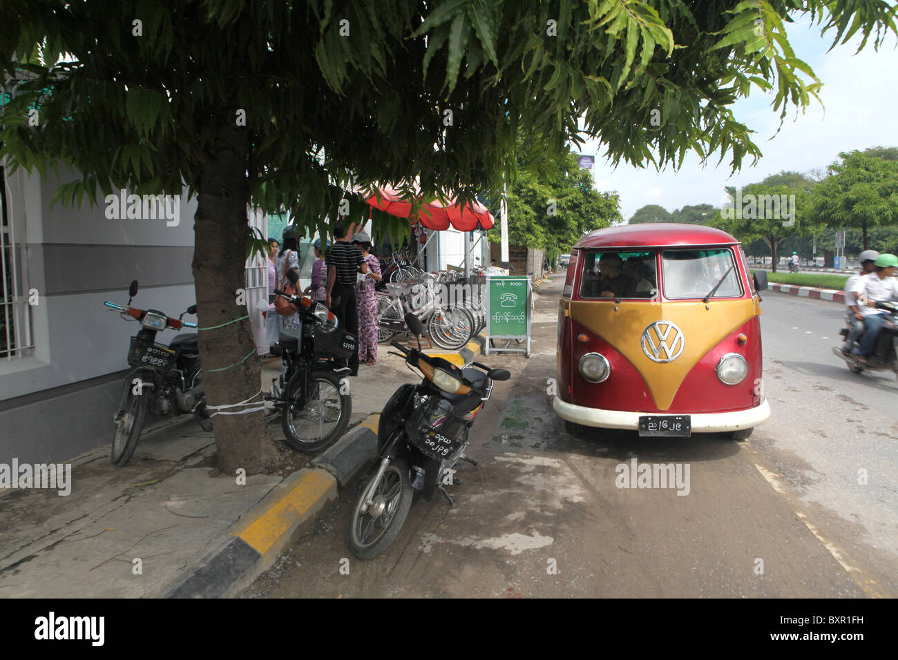 A Volkswagen VW combi van on the street in central Mandalay, Myanmar ...