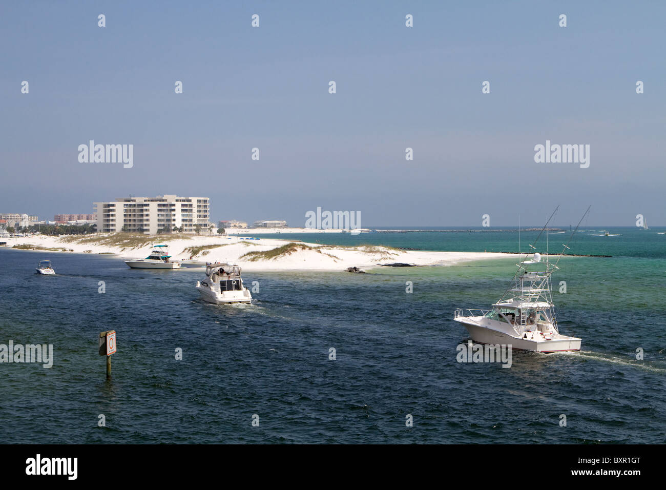 Charter fishing boats enter Destin Harbor, Florida Stock Photo - Alamy