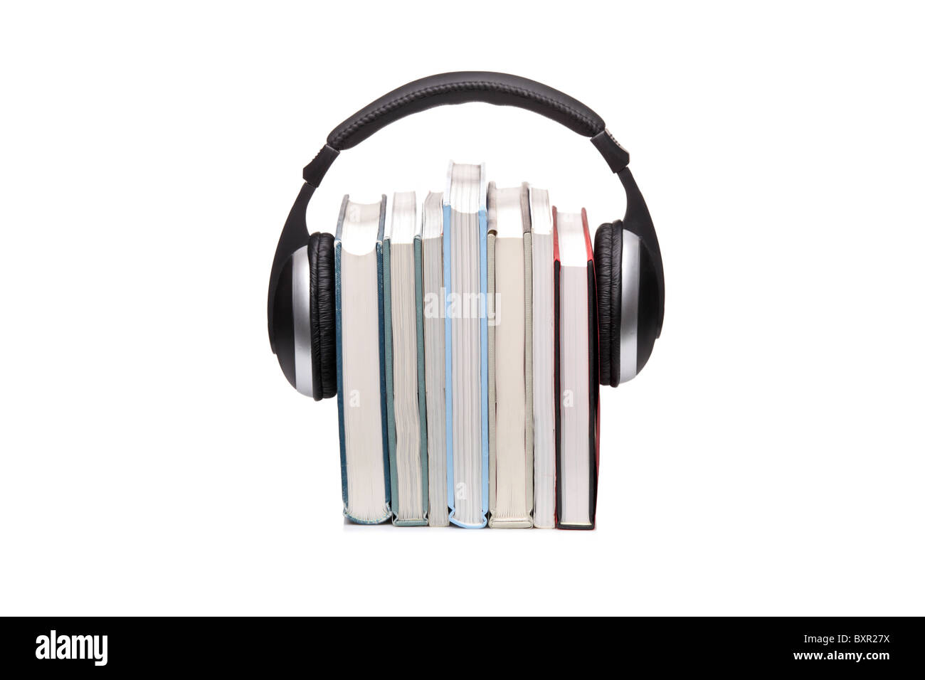 Stack of books and headphones Stock Photo - Alamy