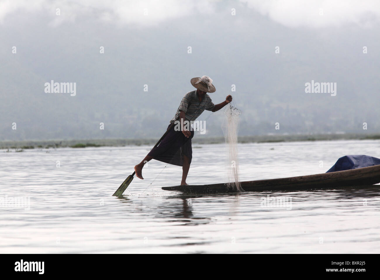 Intha leg rowing fisherman with on Inle Lake in the shan state of north ...