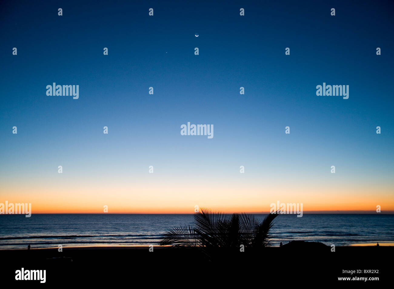 Sunset over the sea Stock Photo - Alamy