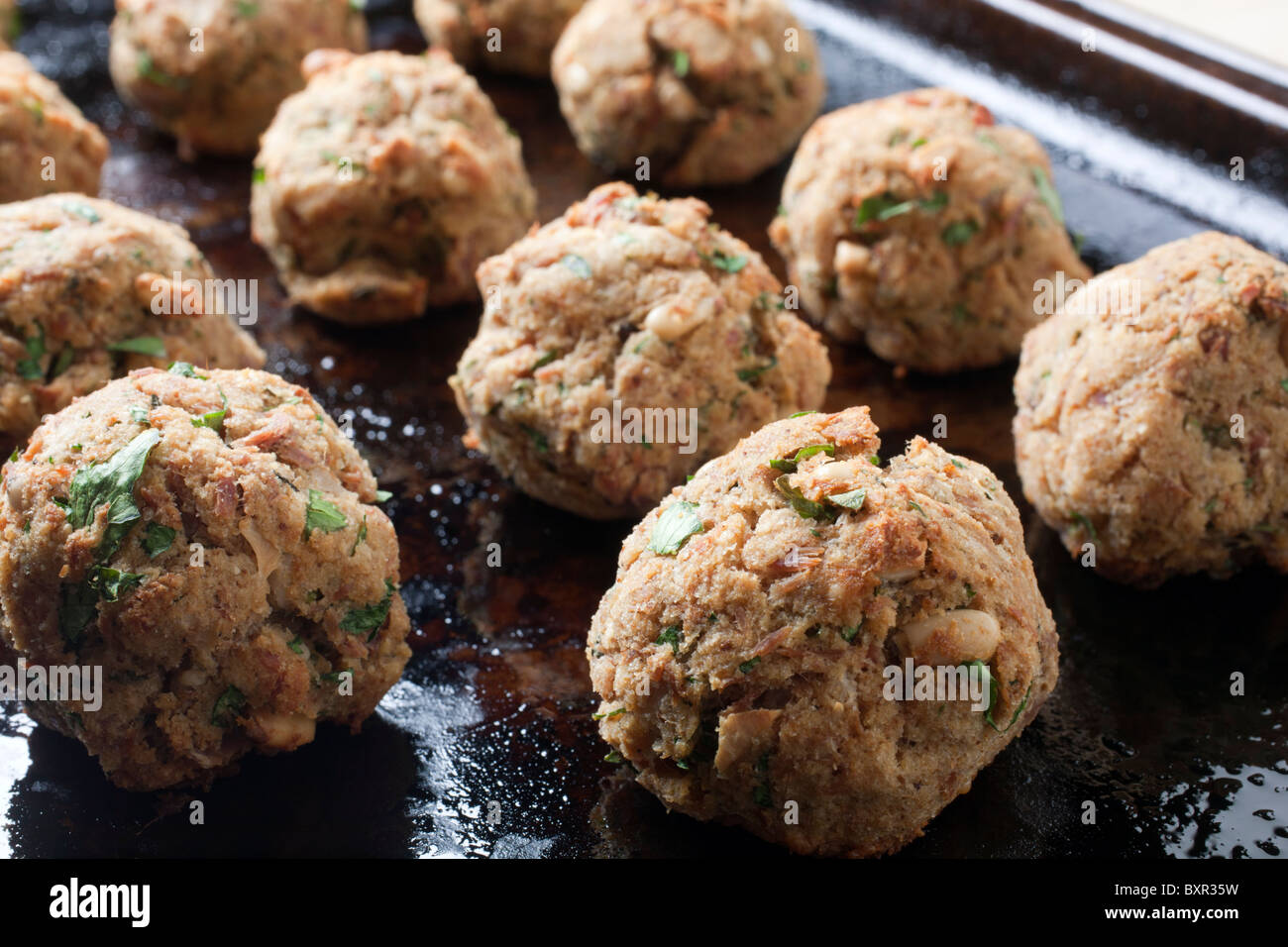 Baked tuna meatballs Stock Photo - Alamy