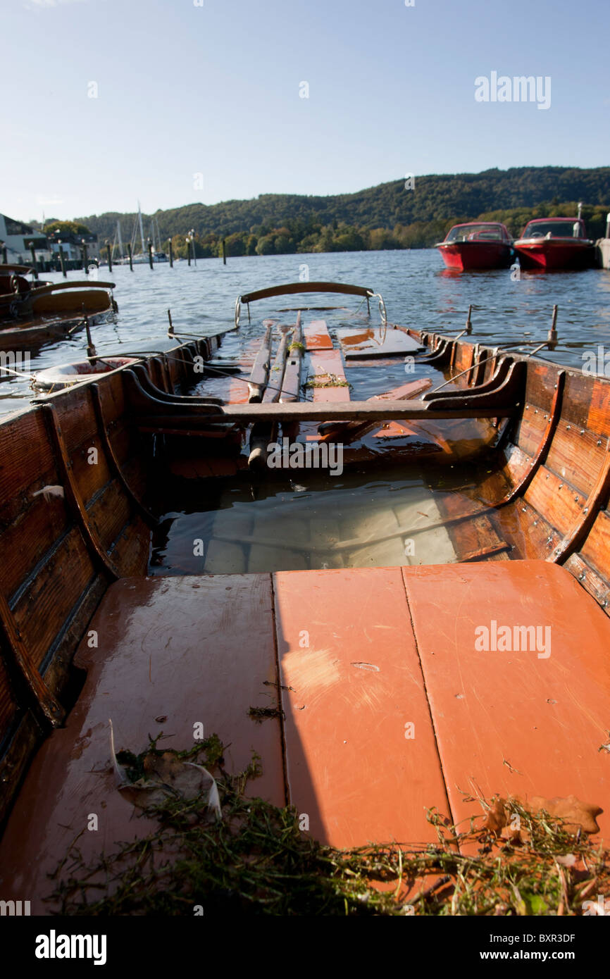 Flooded Rowing Boats on Lake Windermere after heavy rain Stock Photo ...