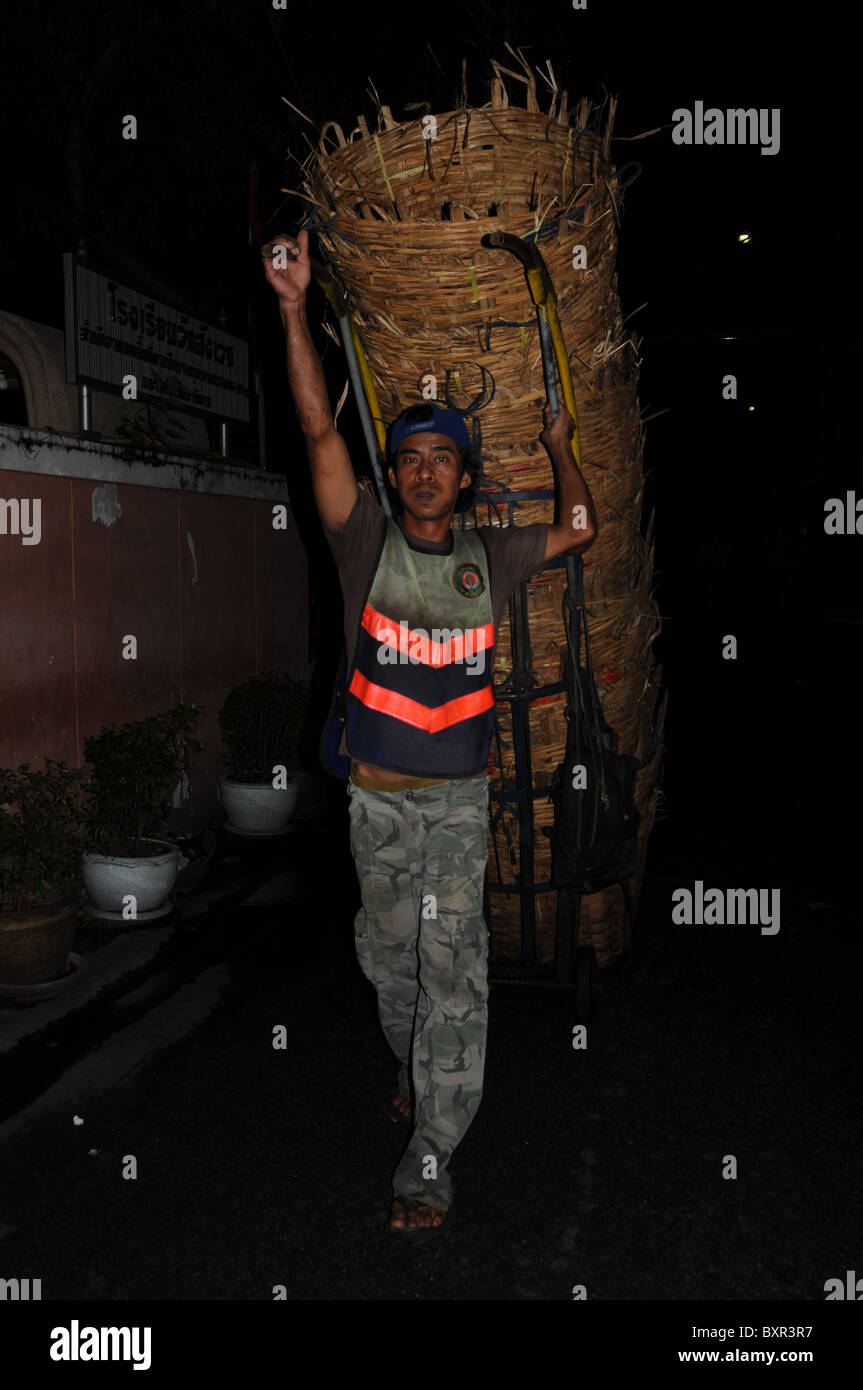Worker bring Trash Cans back to old Place Stock Photo - Alamy