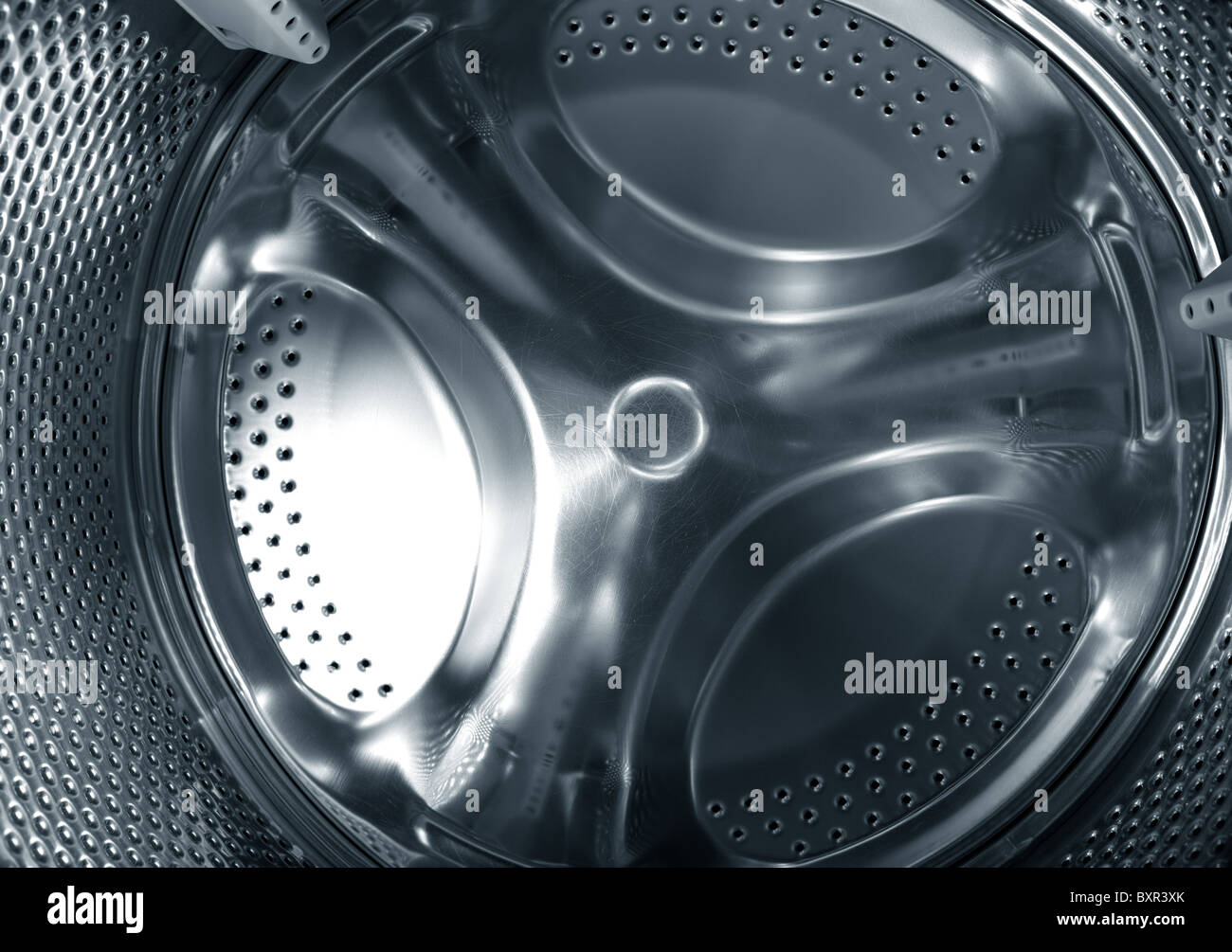 Close-up photo of the metal circular element of washing machine Stock ...