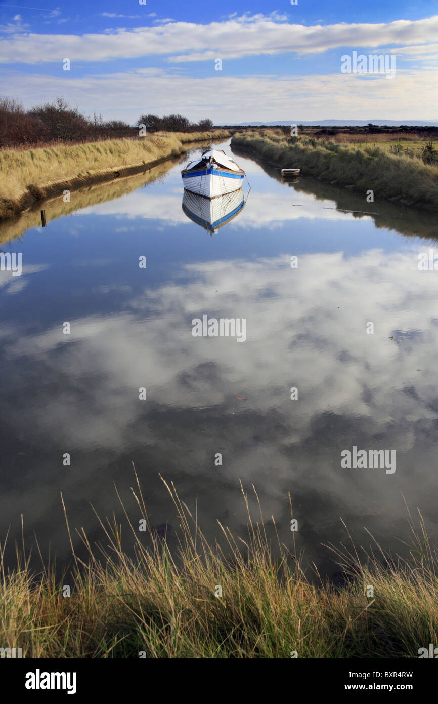 A boat moored on Pennington Marshes in Hampshire Stock Photo - Alamy