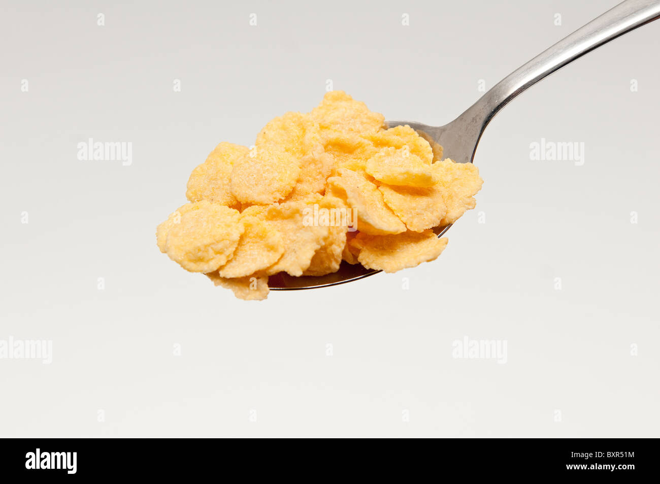 Corn flakes on the spoon Stock Photo - Alamy