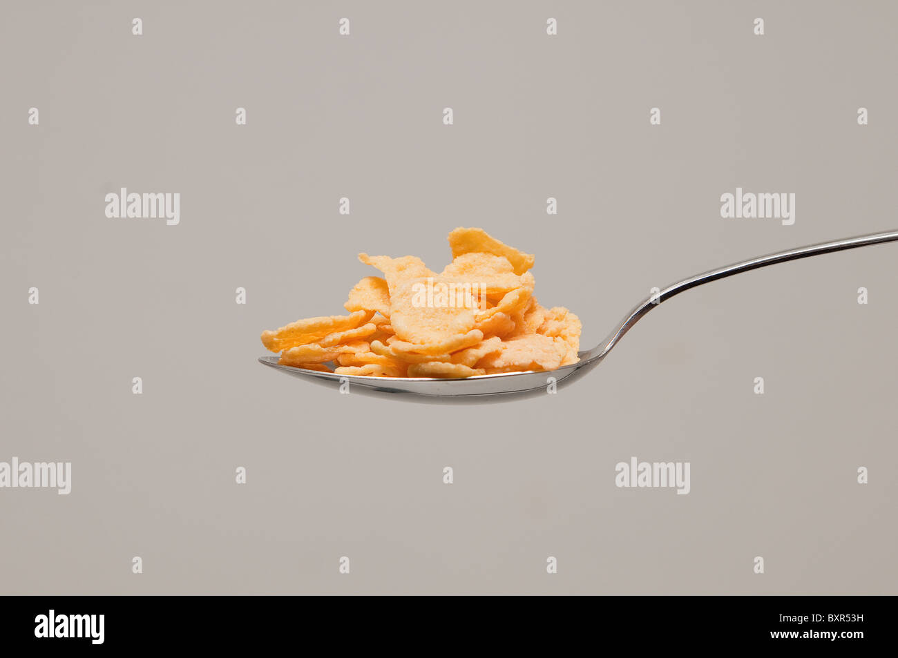 Corn flakes on the spoon Stock Photo - Alamy