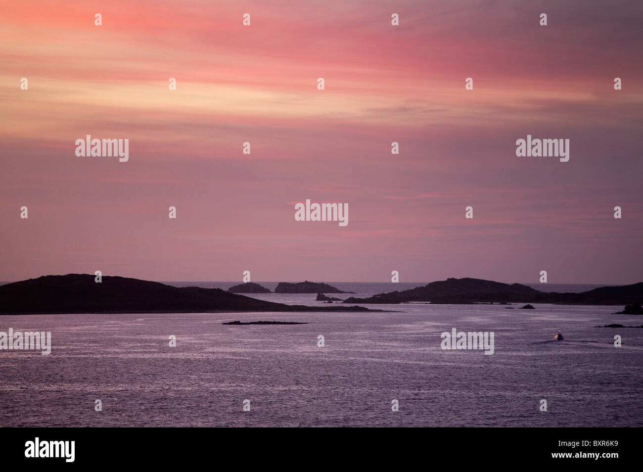 Sunset over the isles of Scilly, uk Stock Photo - Alamy