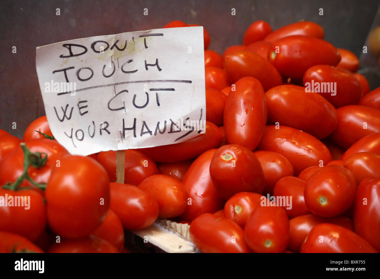 Funny sign with box of bright tomatoes at an Italian market Stock Photo ...