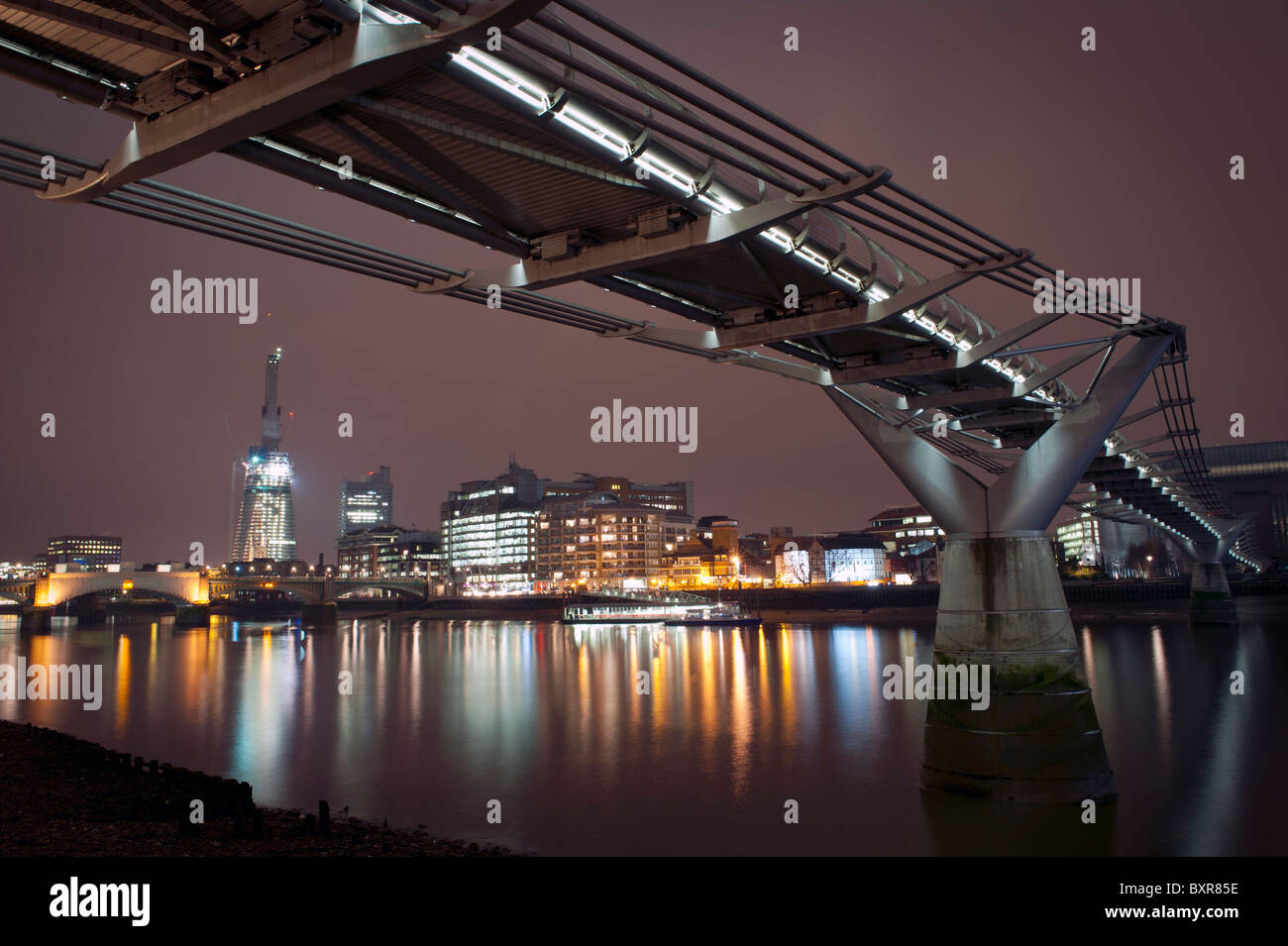 A view of the River Thames in London underneath the Millennium bridge ...