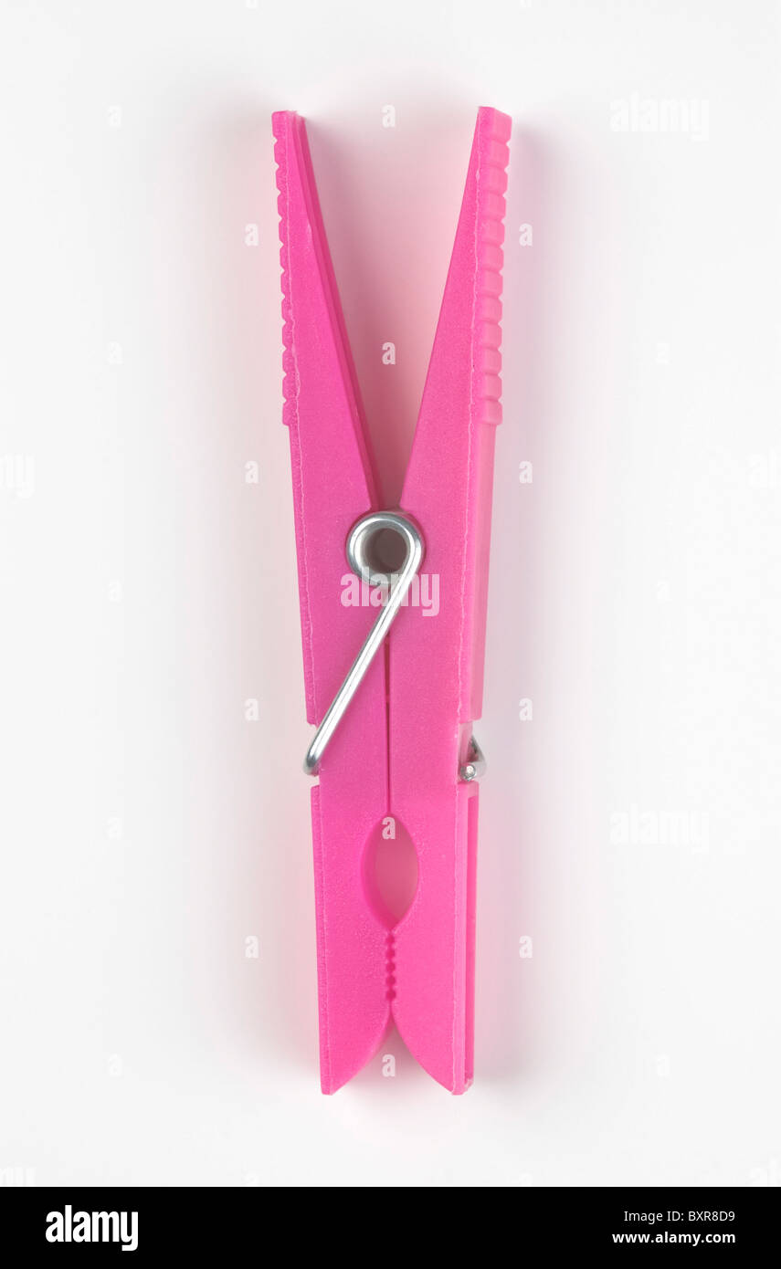 A pink plastic clothespin on white Stock Photo - Alamy