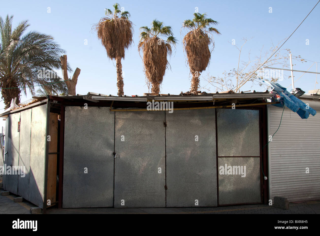 Closed shuttered shops hi-res stock photography and images - Alamy