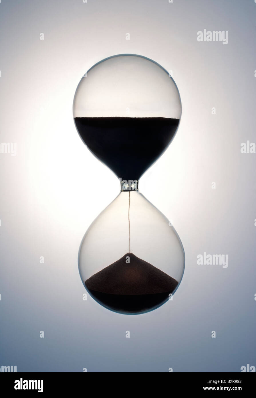 Hour glass with sand Stock Photo - Alamy