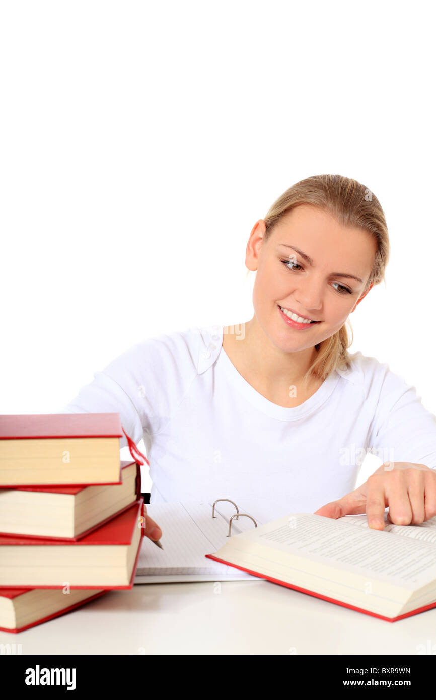 Attractive blonde woman studying. All on white background Stock Photo ...