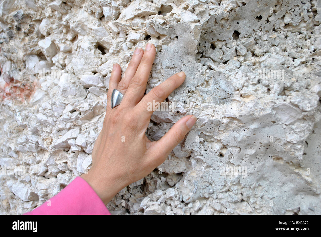 woman's hand on the rock Stock Photo - Alamy