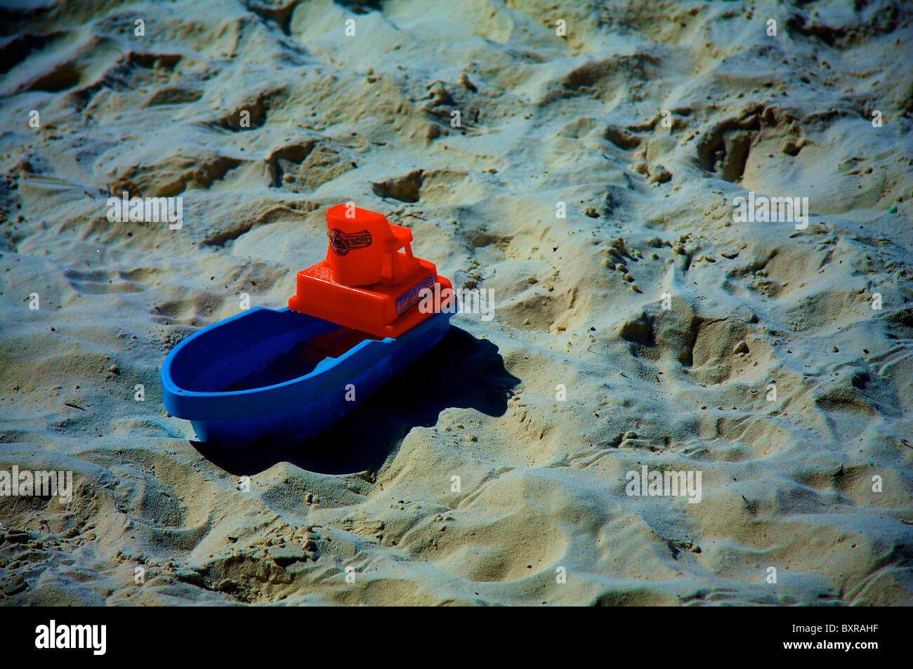 a ship sailing a sea of sand Stock Photo - Alamy