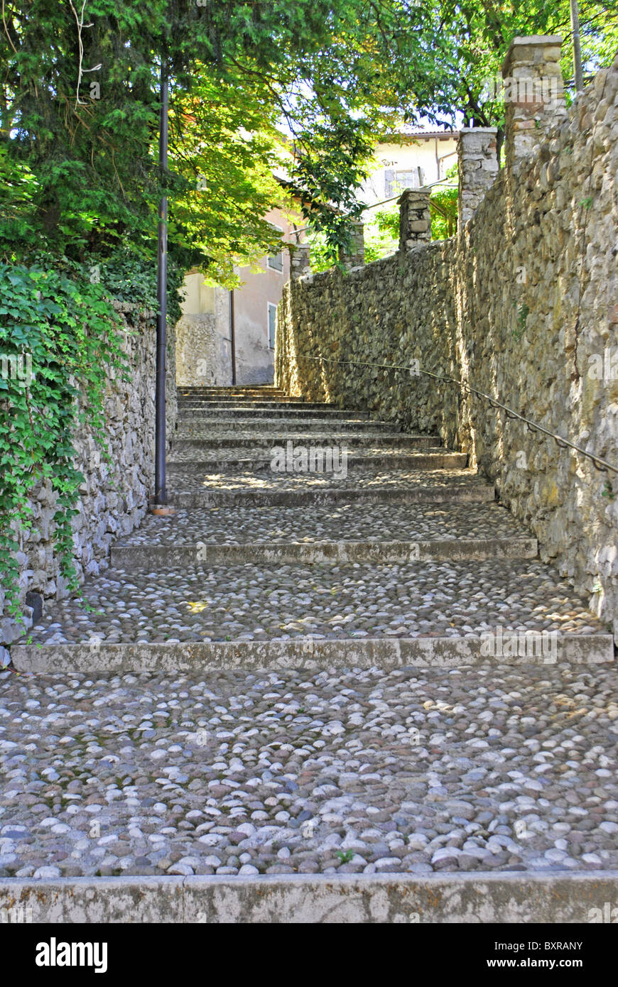 road stones with high stone walls typical access to rural areas Stock ...