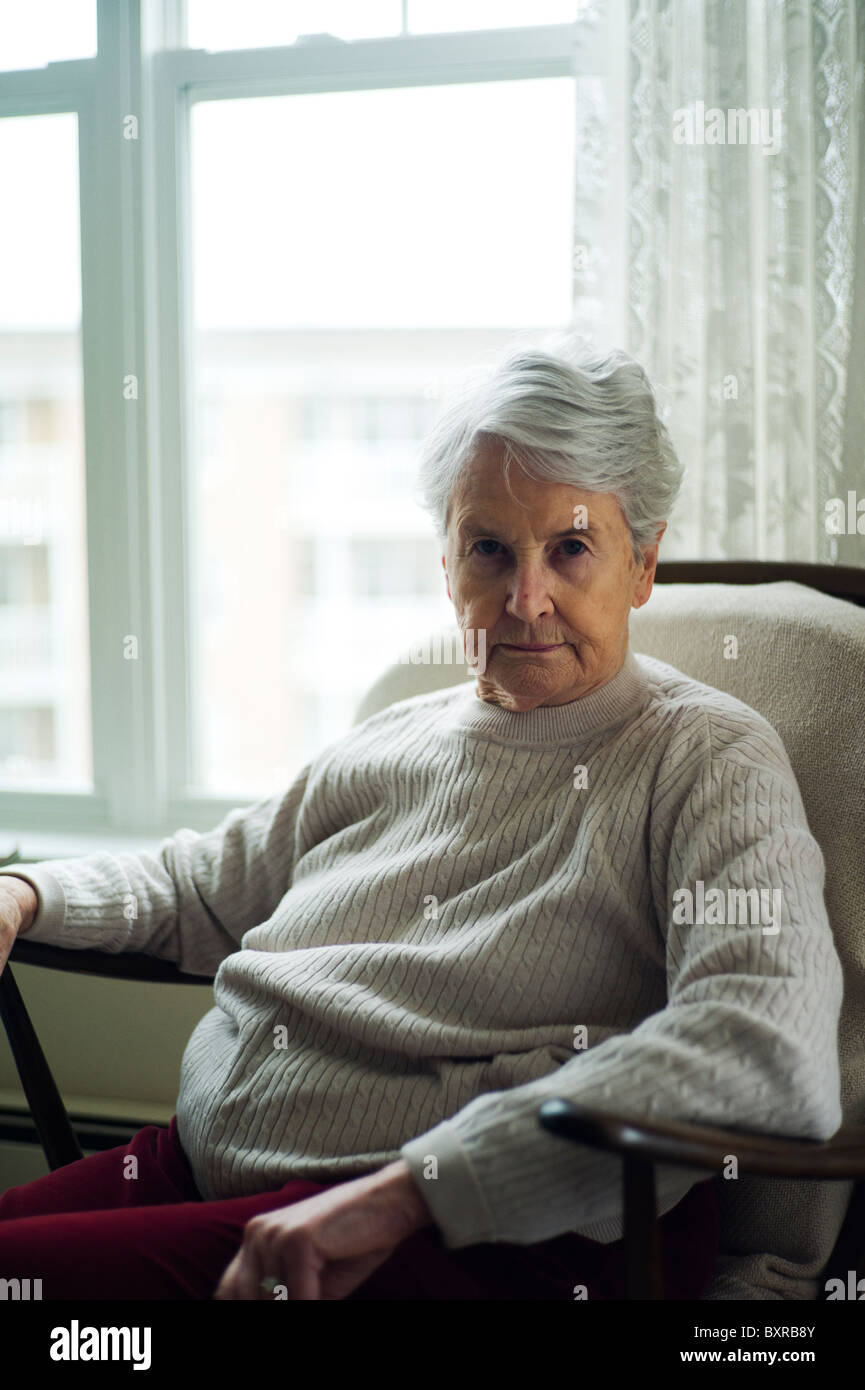 Old woman stares at camera Stock Photo - Alamy