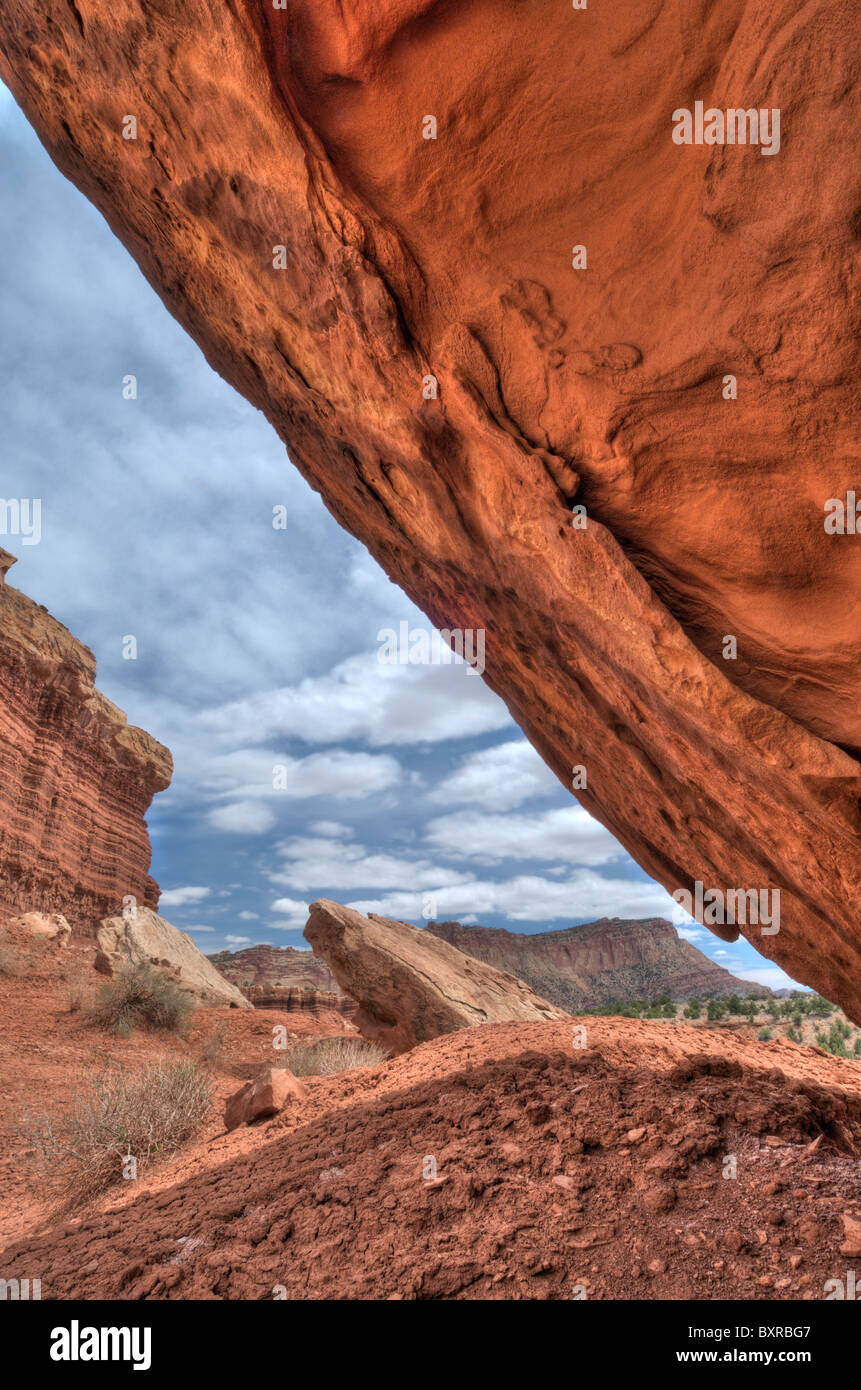 Surreal HDR image of rock formations beneath the cliffs of Capitol Reef ...