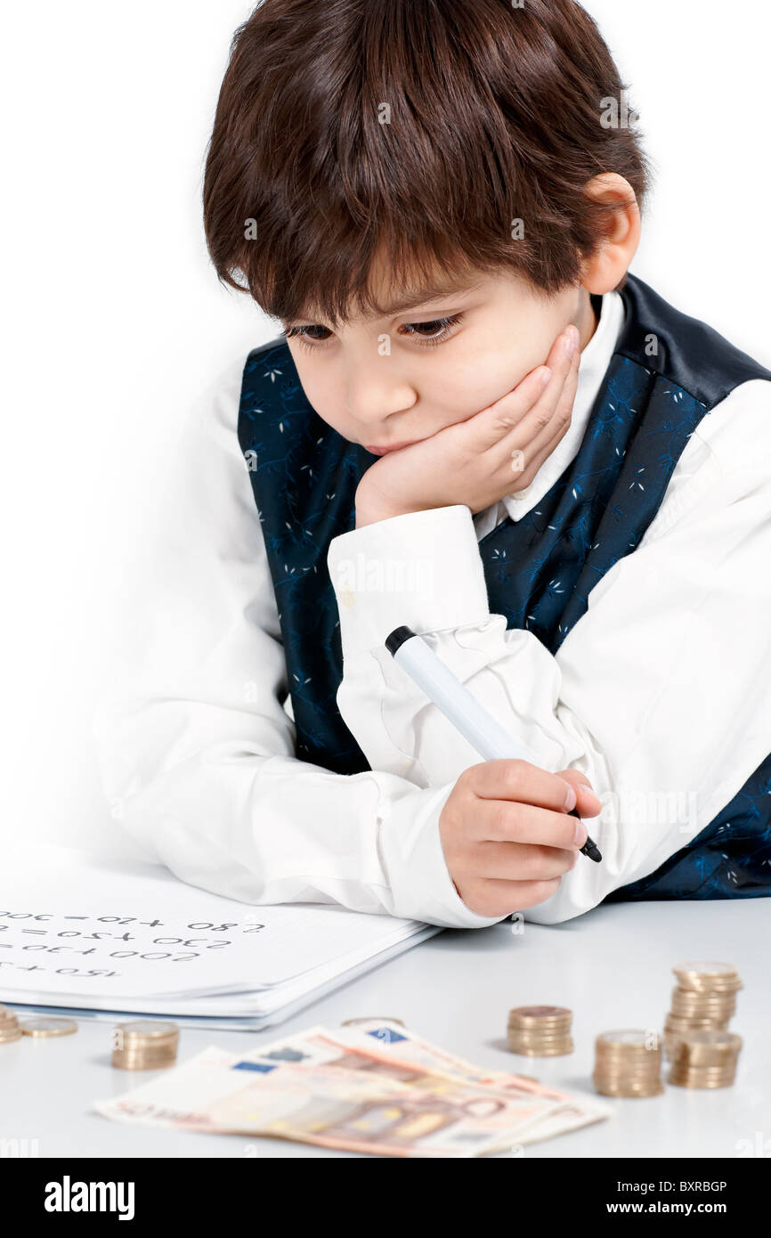 Child counting money and taking notes Stock Photo - Alamy