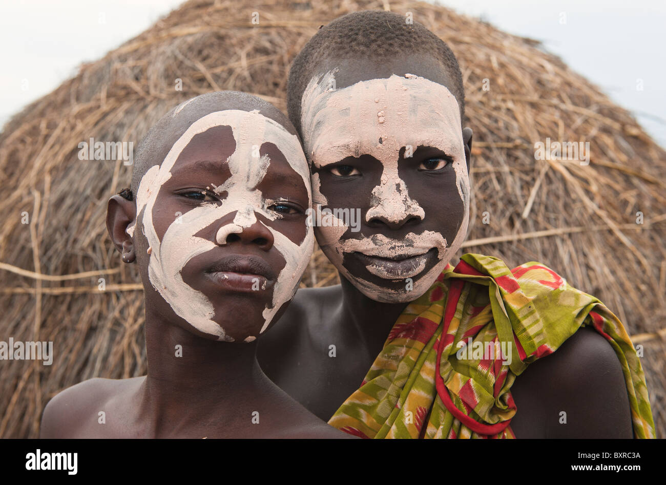 Two Nyangatom (Bumi) boys with their face painted, Omo river Valley ...