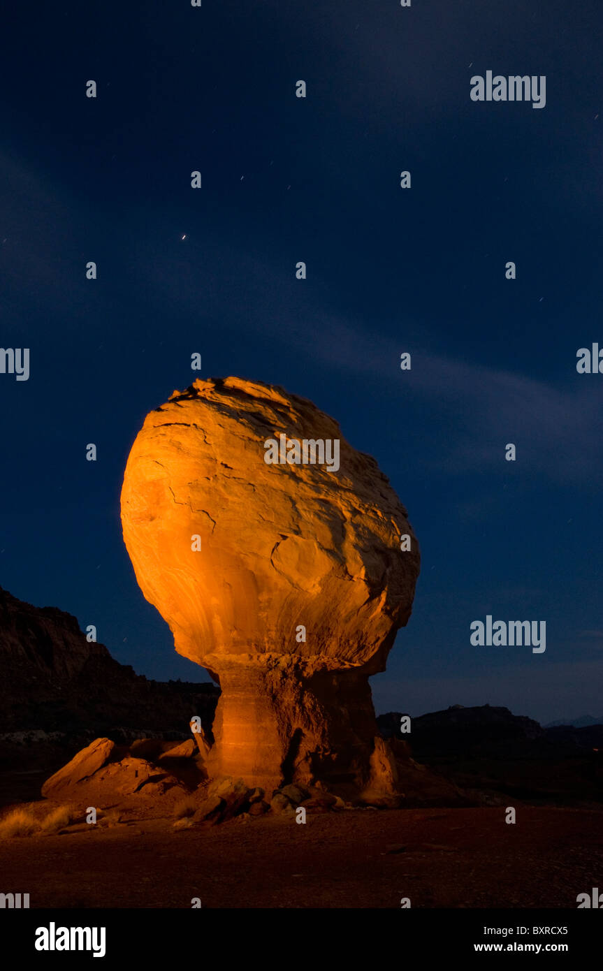 A warm glowing light painting of Twin Rocks, Capitol Reef National Park ...