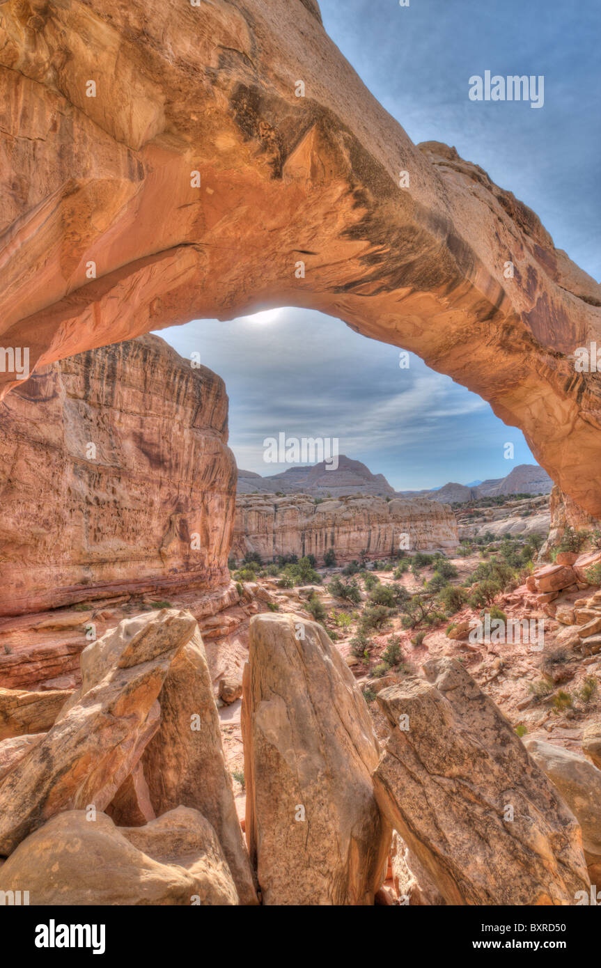 Surreal HDR image looking through the arch of Hickman Bridge, Capitol ...