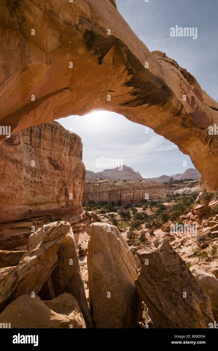 Looking through the arch of Hickman Bridge, Capitol Reef National Park ...
