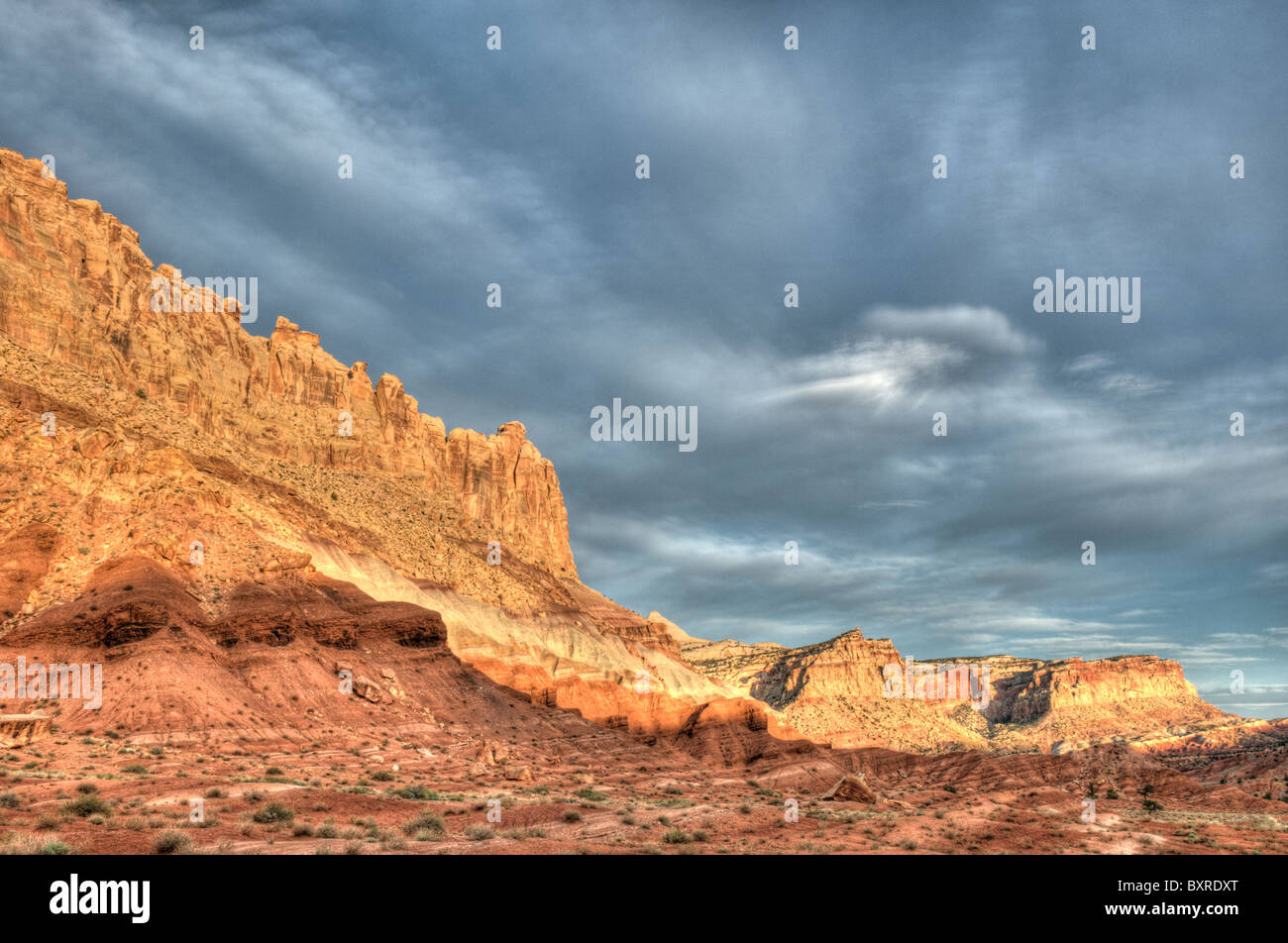 Surreal HDR image of red cliffs of Capitol Reef at sunset Stock Photo ...