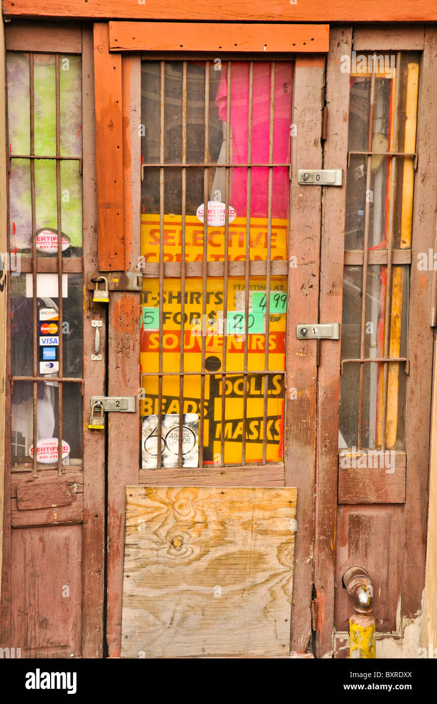 Closed up shop door with four locks architectural detail, French ...