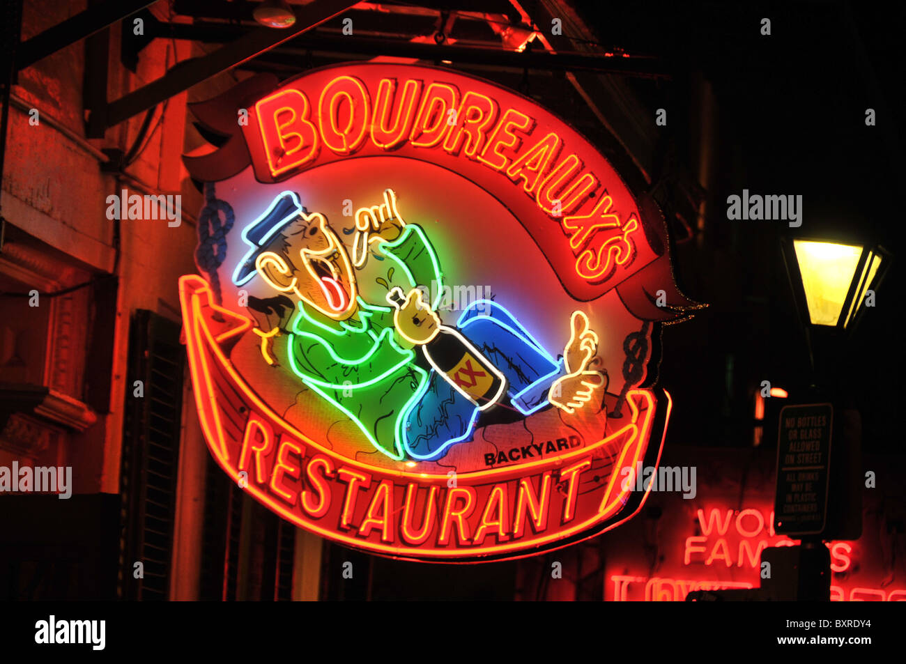 Boudreaux's Backyard Restaurant' neon sign on Bourbon Street, French ...