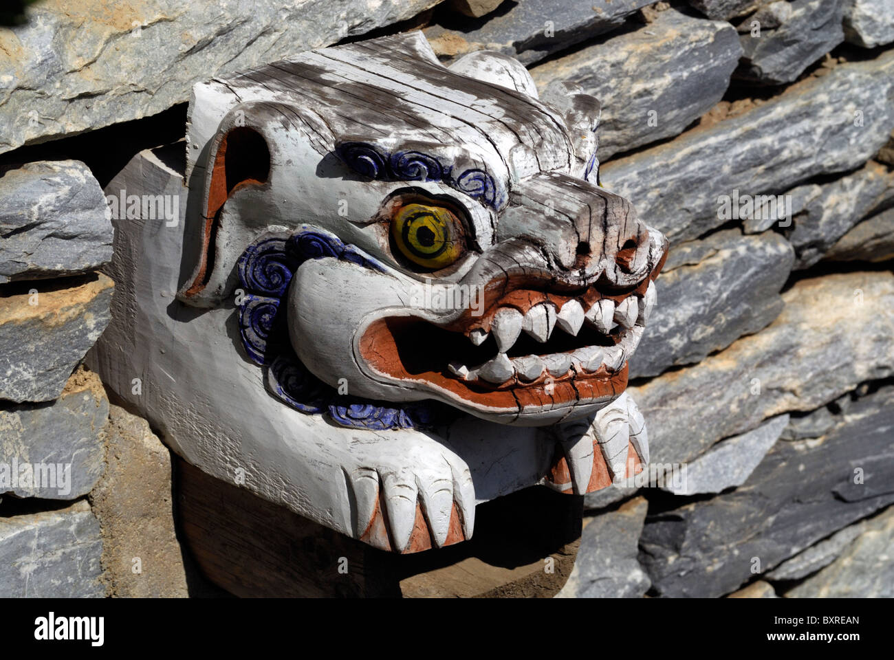 Lion wood carving in Bhutanese style,Rajapreuk garden,Chiang Mai Stock ...