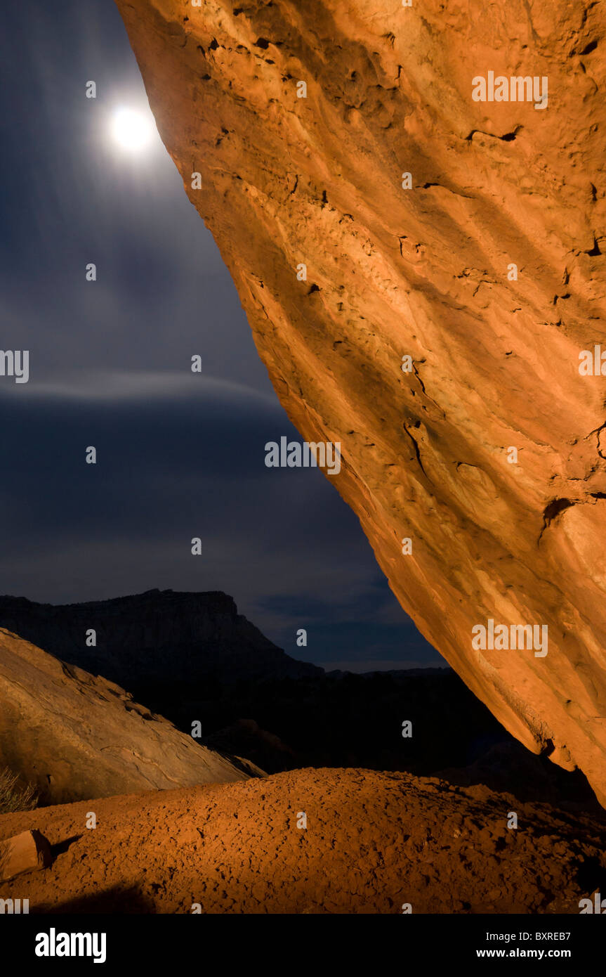Surreal light painting of rock and landscape with moon at Capitol Reef ...