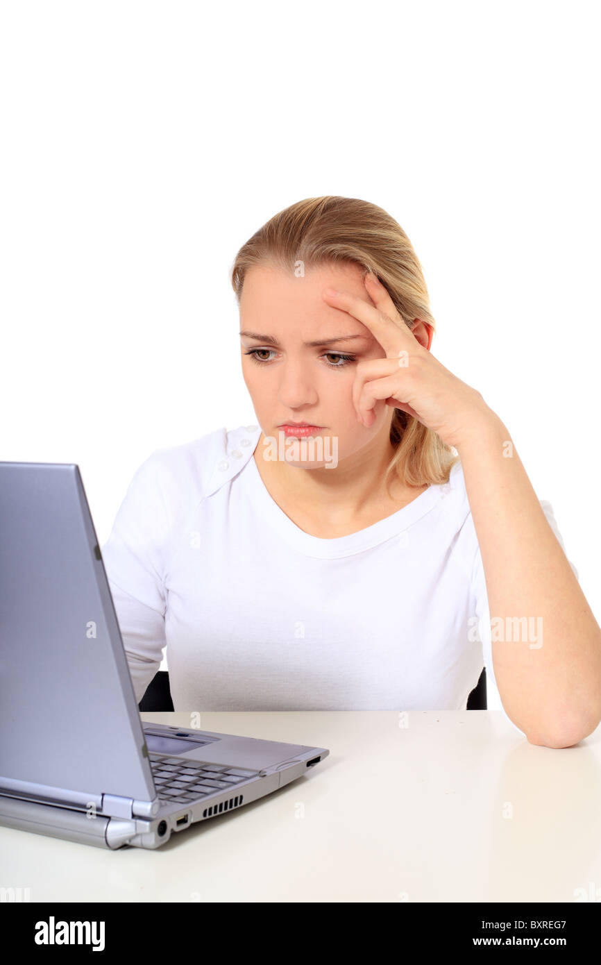 Attractive blonde woman got a problem with her notebook computer. All ...