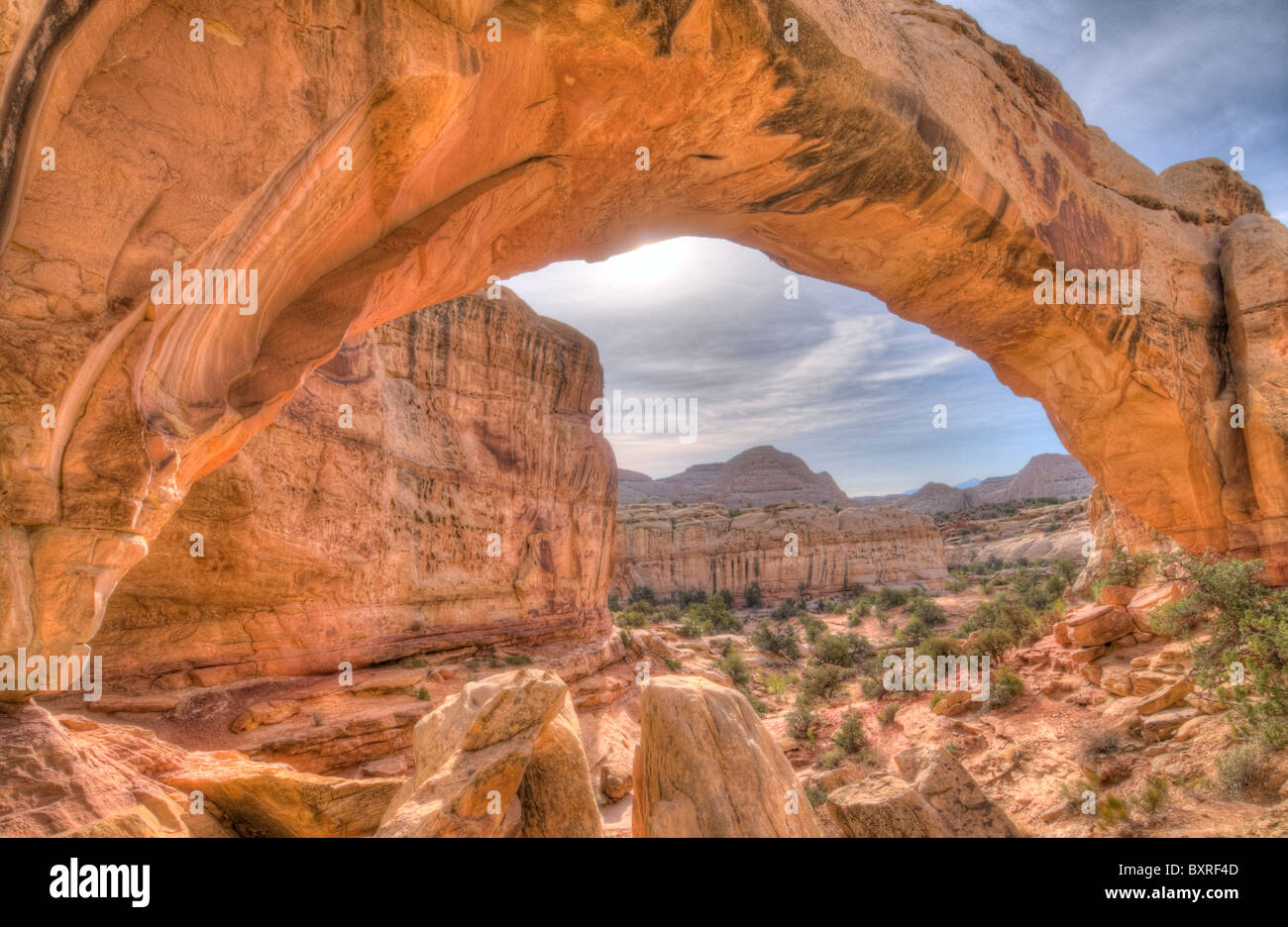 Surreal HDR image looking through the arch of Hickman Bridge, Capitol ...
