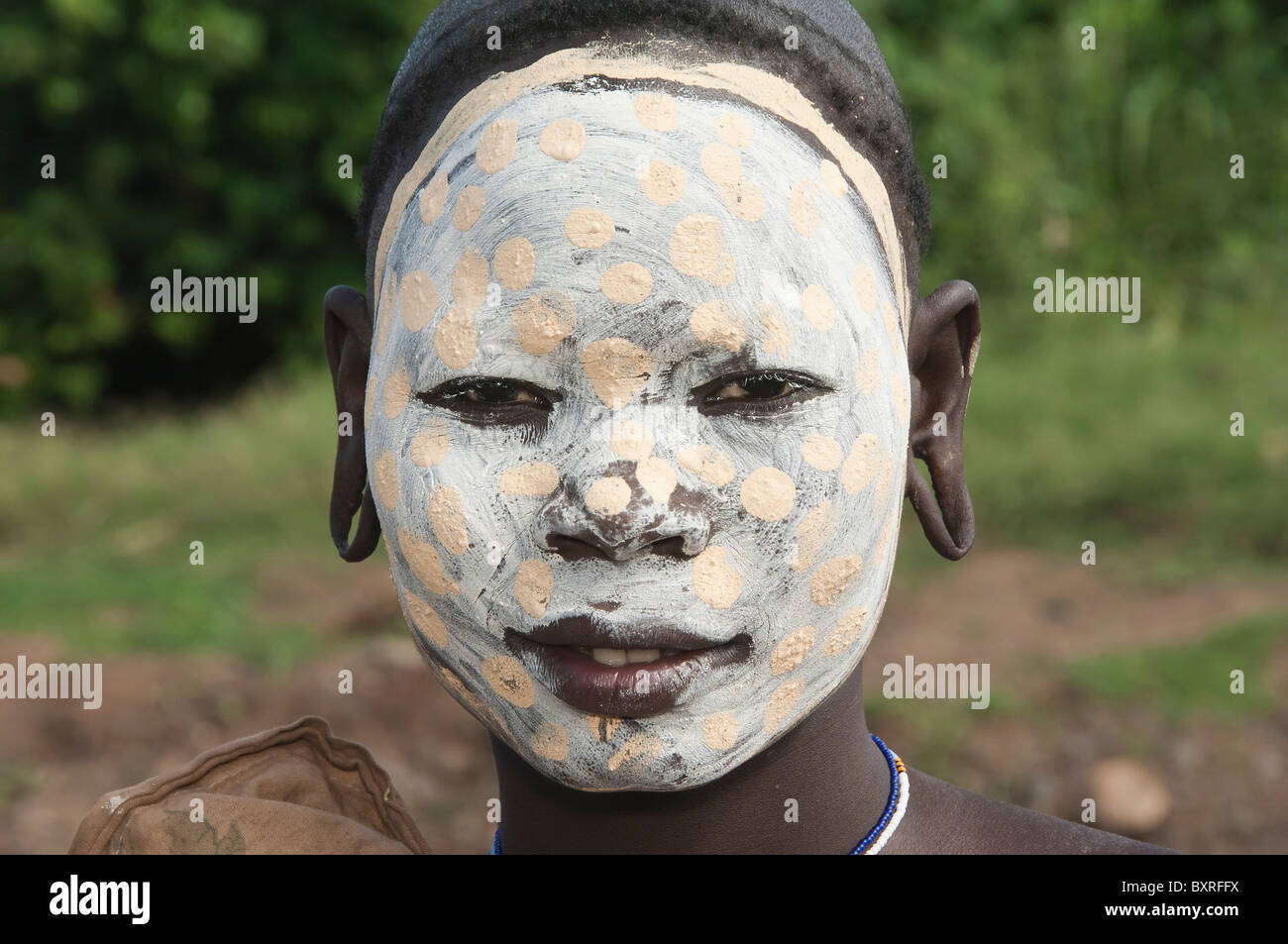 Omo tribe ears hi-res stock photography and images - Alamy