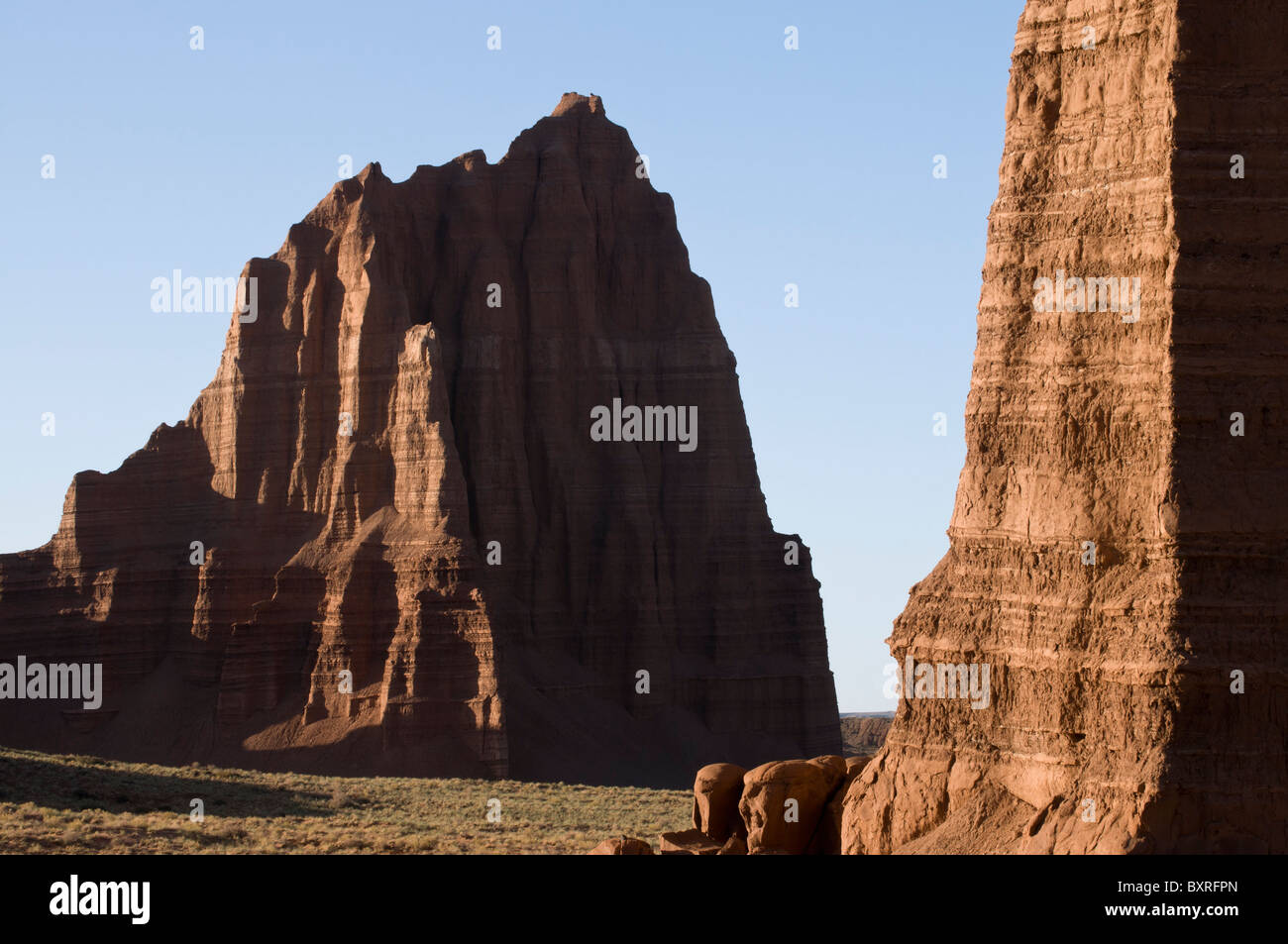 The red sandstone monolith, "Temple of the Sun" framed by it's twin ...