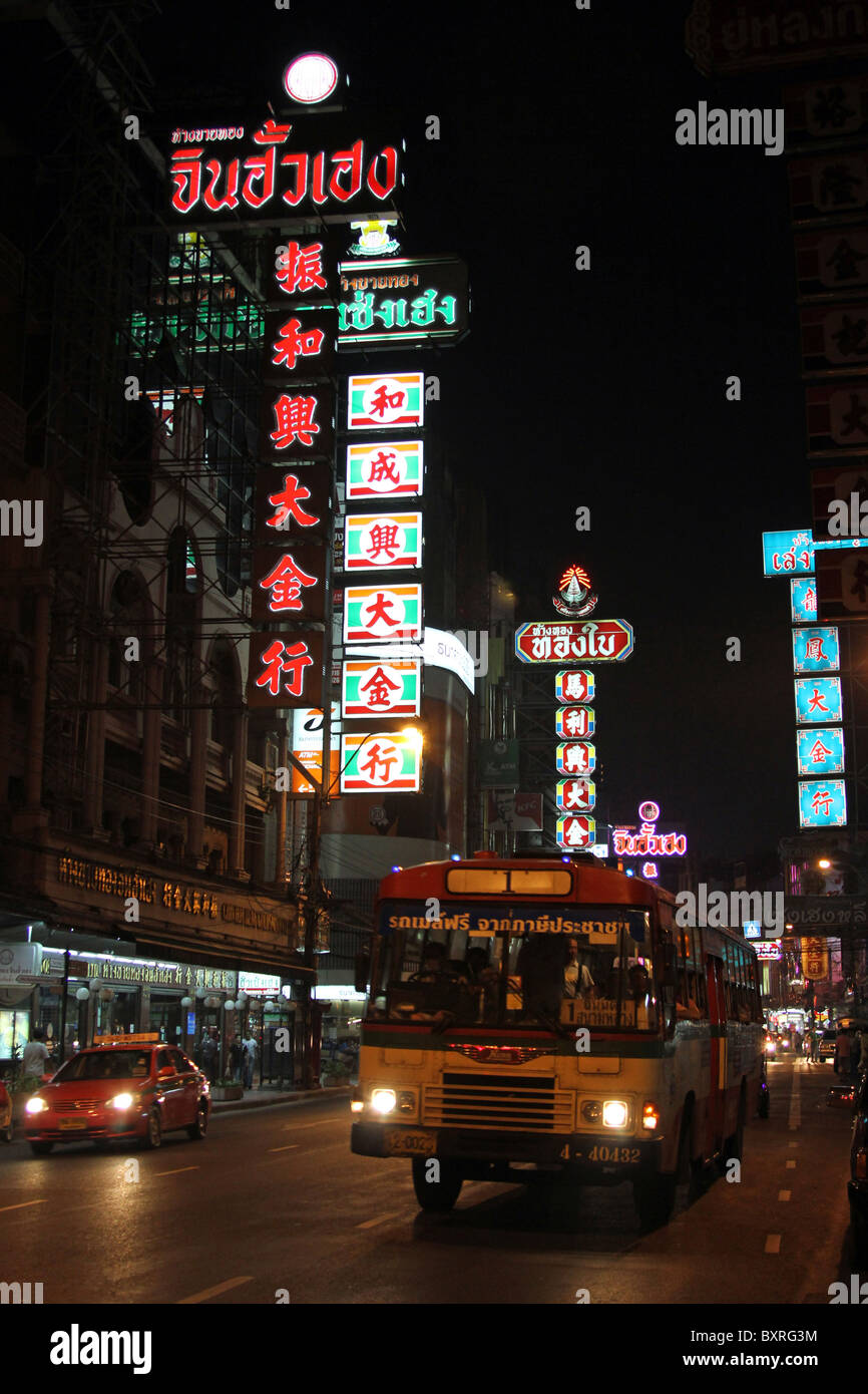 Neon lights and signs with Chinese and Thai writing characters in ...