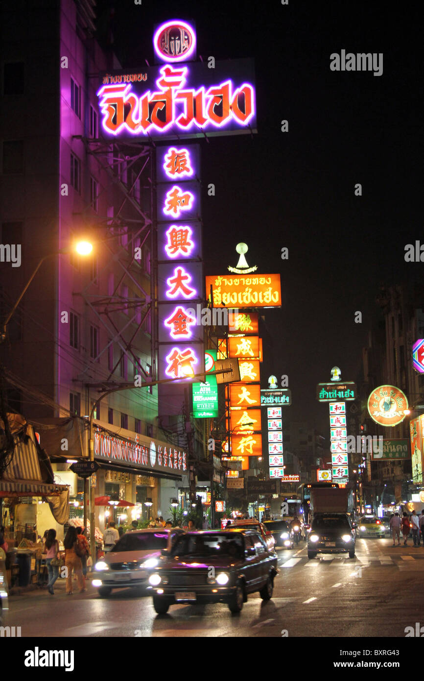 Neon lights and signs with Chinese and Thai writing characters in Chinatown in Bangkok, Thailand ...