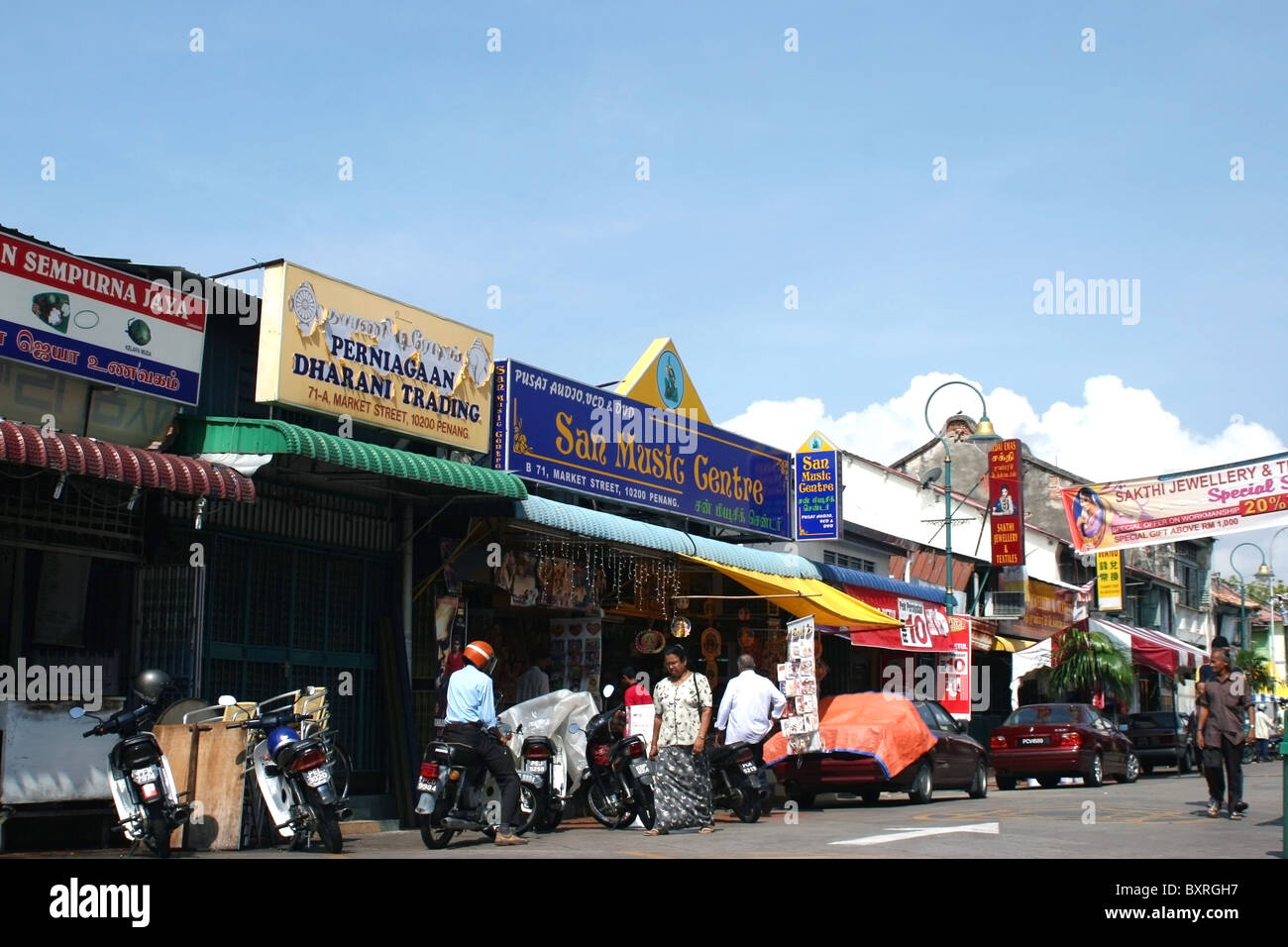 Busy shoppers are visiting stores on Market Street in the Indian ...