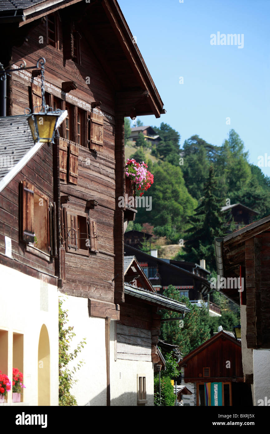 A traditional chalet and street view in the village of Vercorin in ...