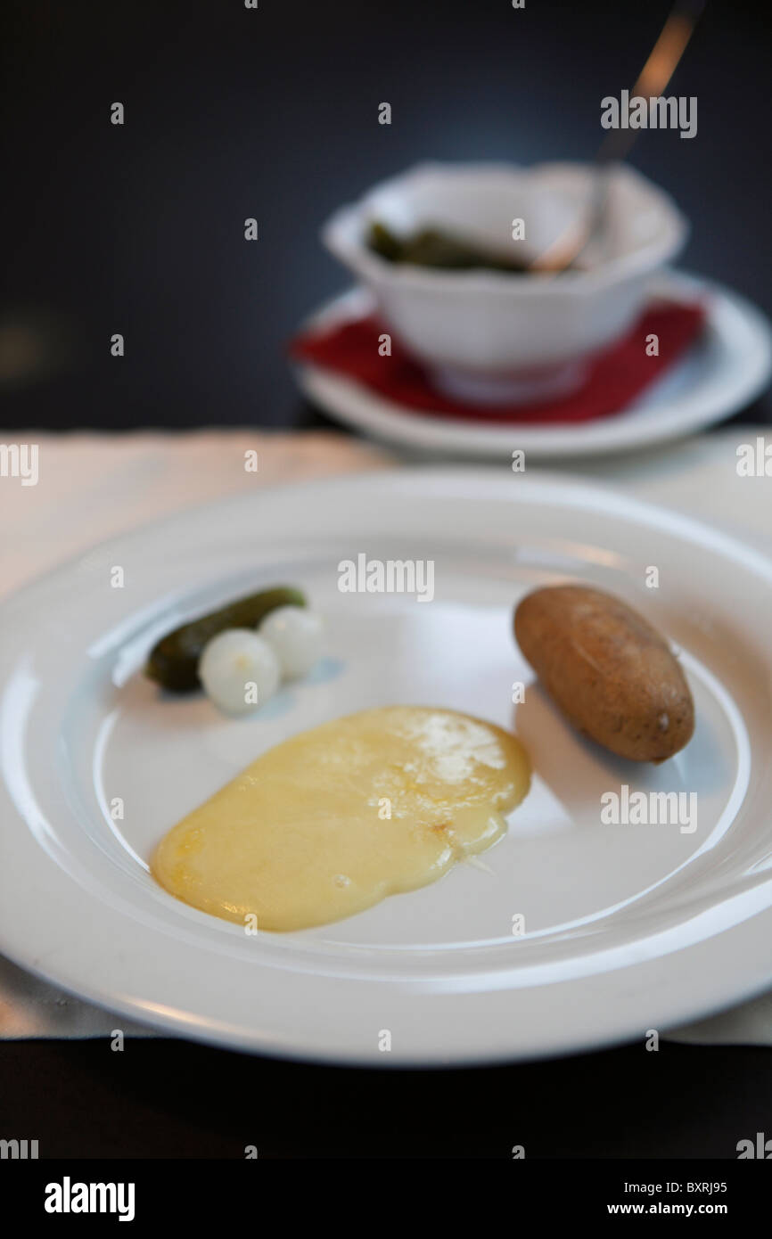 Raclette served at the restaurant Relais du Château in Château de Ville ...