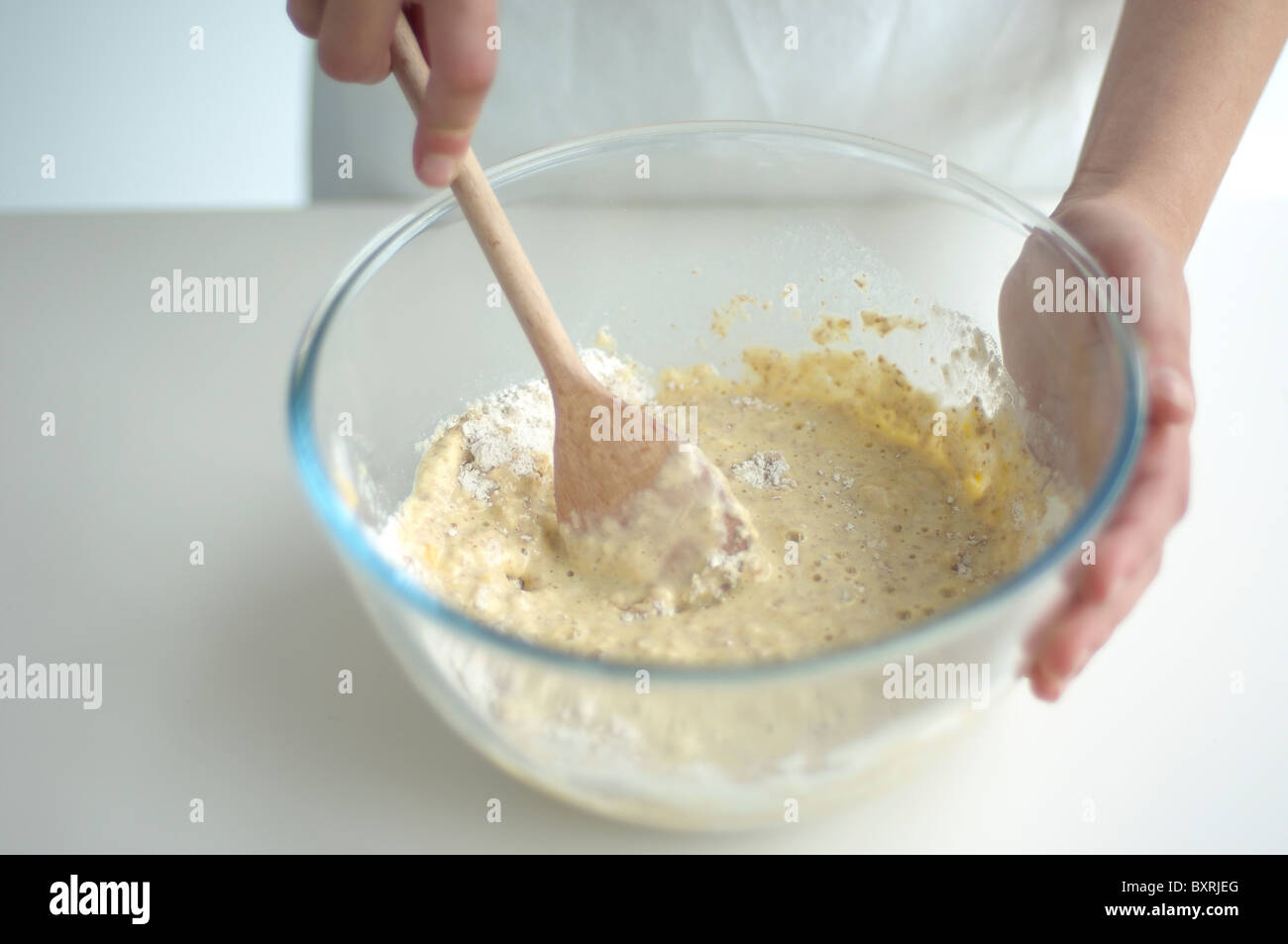 Hand mixing pancake batter in bowl, close-up Stock Photo - Alamy
