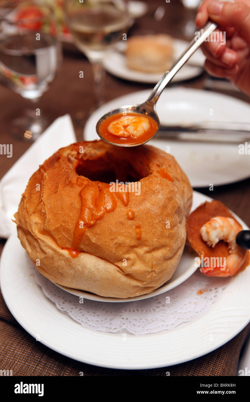 Shrimp soup in a loaf served in a restaurant in Macau Stock Photo - Alamy