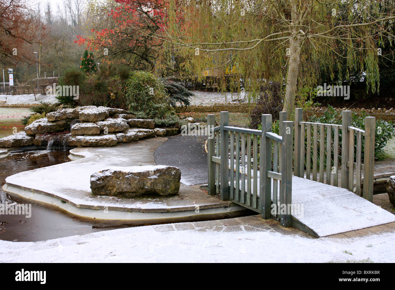 Ice covered pond and gardens in an English Communial Park Stock Photo ...